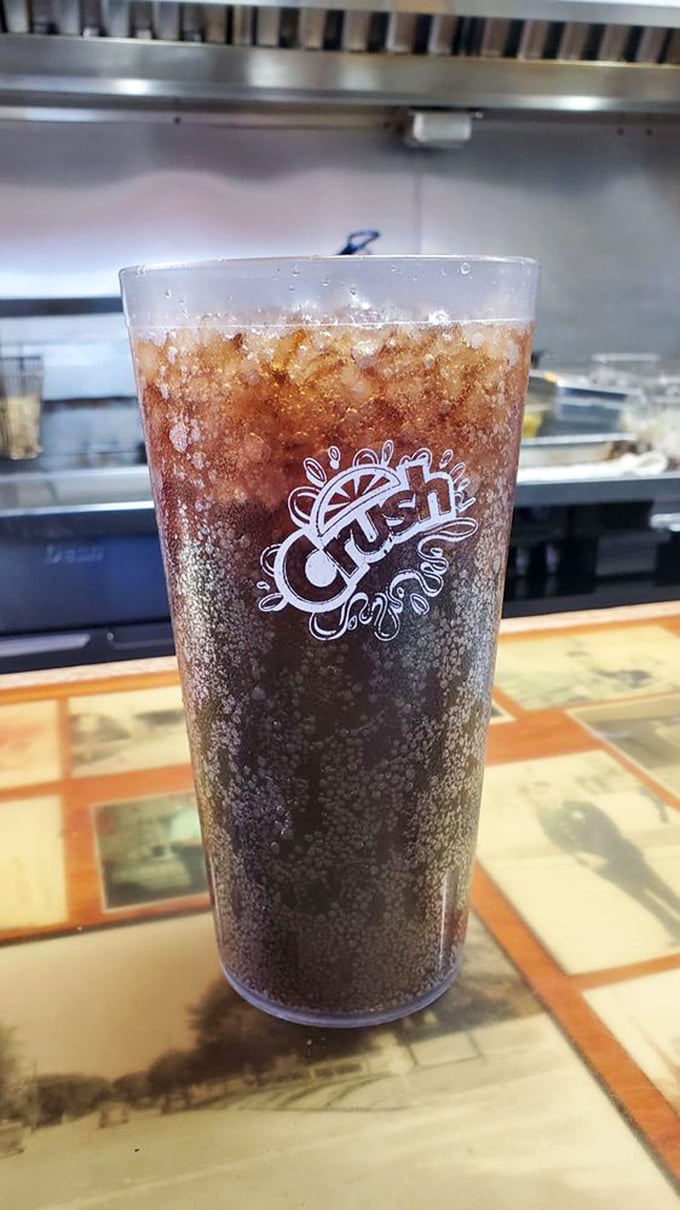 Ice-cold Crush in a frosty glass—the perfect companion to tame the fire of a well-seasoned burger. Simple pleasures at their finest.