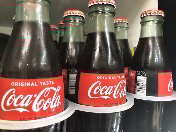 Classic Coca-Cola in glass bottles—because sometimes nostalgia is the secret ingredient that makes lunch taste even better.