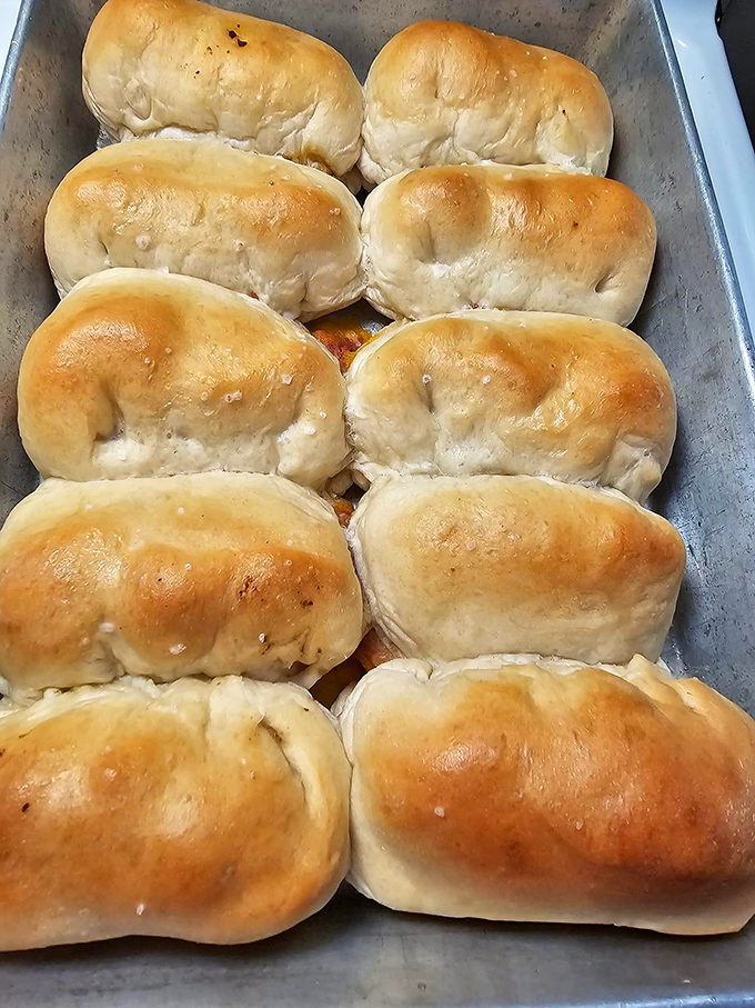 These aren't just rolls—they're pillowy vessels of carb-loaded joy, waiting to soak up every last drop of barbecue sauce.