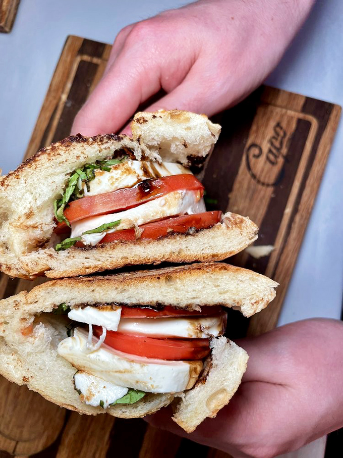 Fresh mozzarella, tomato, and basil – Italy's flag in edible form. The Caprese sandwich is summer sunshine between two pieces of bread.