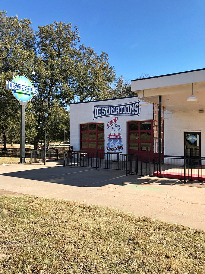 "Destinations" indeed—this pristine white building with its classic red doors promises Route 66 treasures for road-weary travelers.