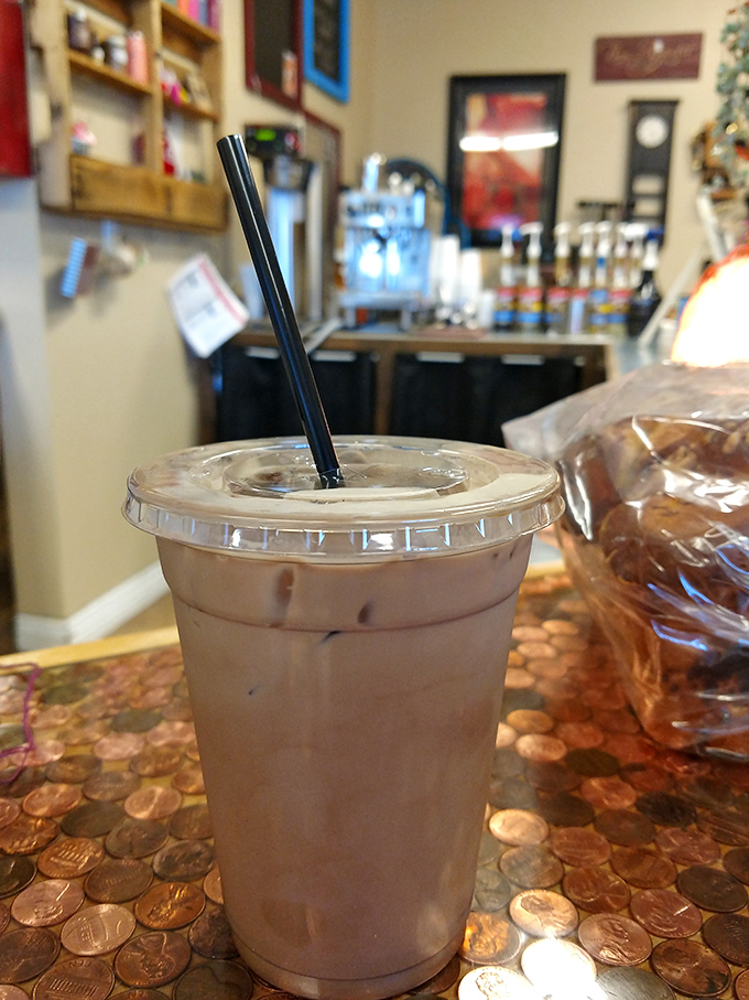 That's not just a coffee—it's the perfect dance partner for your pastry. The penny-topped counter adds a touch of homespun charm.