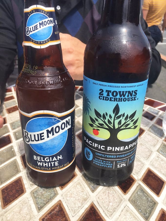 Cold beverages on a tiled table—because after a day of coastal adventures, you've earned this moment of pure refreshment.