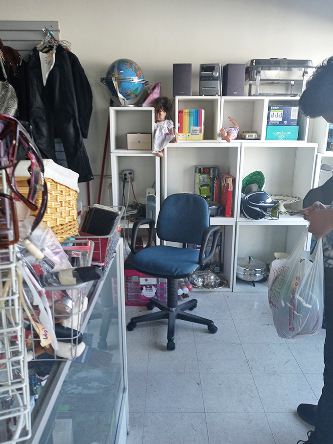 Office furniture mingles with electronics in this corner of possibility—where your next home office setup costs less than a fancy dinner for two.