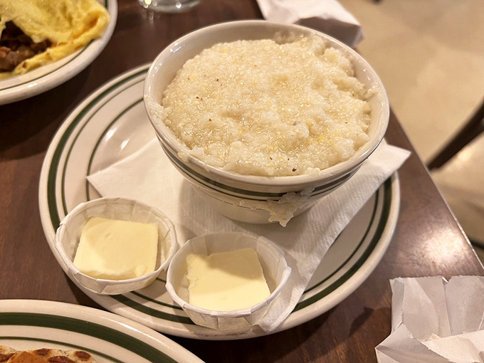 Southern comfort in a bowl – creamy grits with butter pats melting like little golden rafts. Yankee friends, this is what you've been missing.