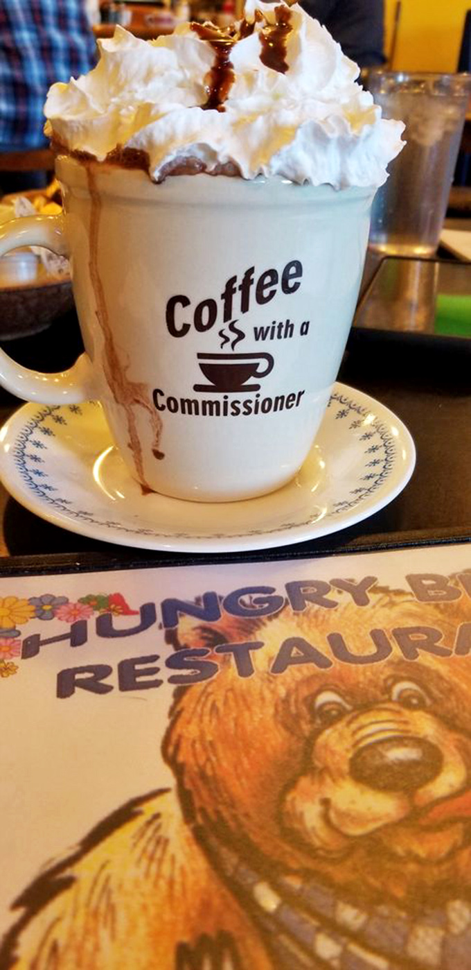 Coffee elevated to art form—whipped cream mountain peaks drizzled with chocolate syrup. This mug doesn't just wake you up, it throws a party.