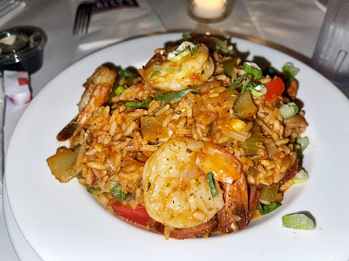 Jambalaya that would make a New Orleans chef nod in approval. Every grain of rice has absorbed generations of Cajun cooking wisdom.