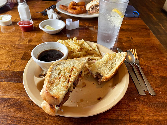 This French dip sandwich isn't playing games—tender brisket, seasoned bread, and an au jus worth bottling and taking home to meet your family.