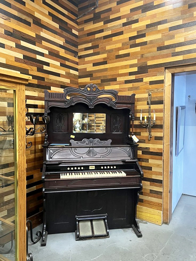 This isn't just a vintage organ—it's a time machine that transported ragtime melodies through decades before landing in this warehouse wonderland.