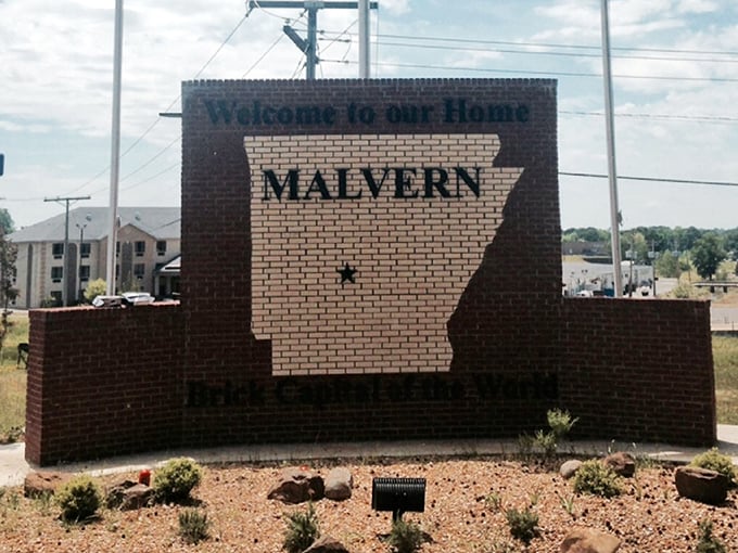 Nothing says "we're proud of our state" quite like a welcome sign shaped like Arkansas itself—built entirely of locally-made bricks, naturally.