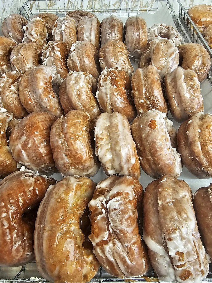 These apple cake donuts have the kind of golden-brown perfection that makes Paul Hollywood weak in the knees. New England autumn in edible form.
