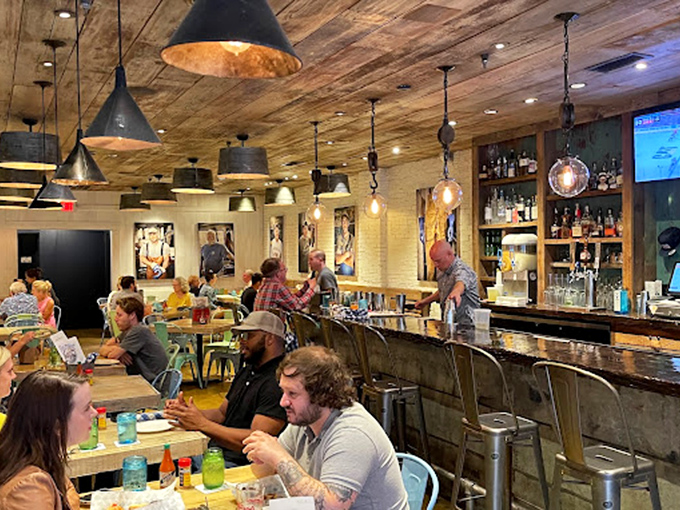 Where seafood pilgrims gather – the bar combines rustic charm with serious libations, proving that cocktails and crustaceans are a match made in culinary heaven.