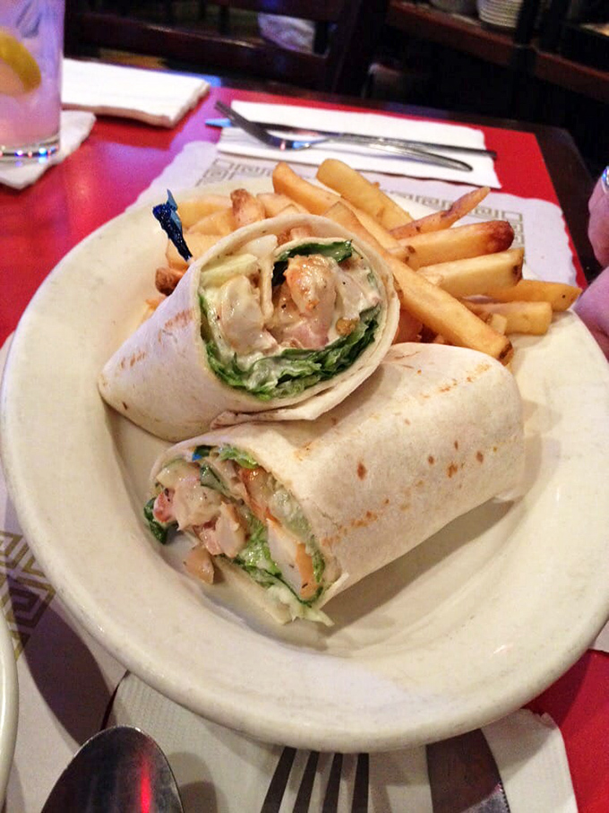 This wrap isn't playing games – plump shrimp, crisp lettuce, and just enough sauce to bind it all together without drowning the flavors.