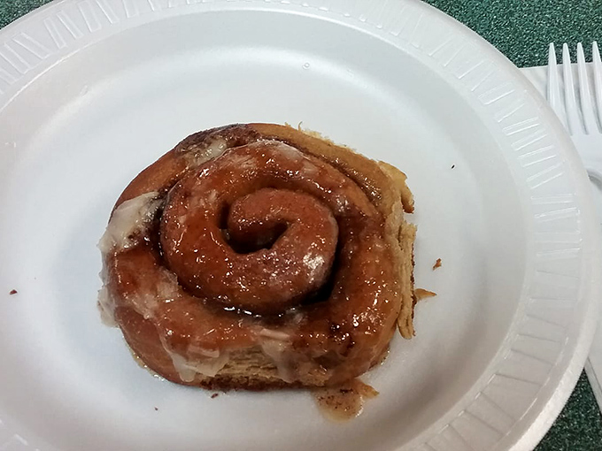 This cinnamon roll isn't trying to be Instagram-famous—it's too busy melting hearts with its gooey center and perfectly sweet glaze. Worth every sticky finger.