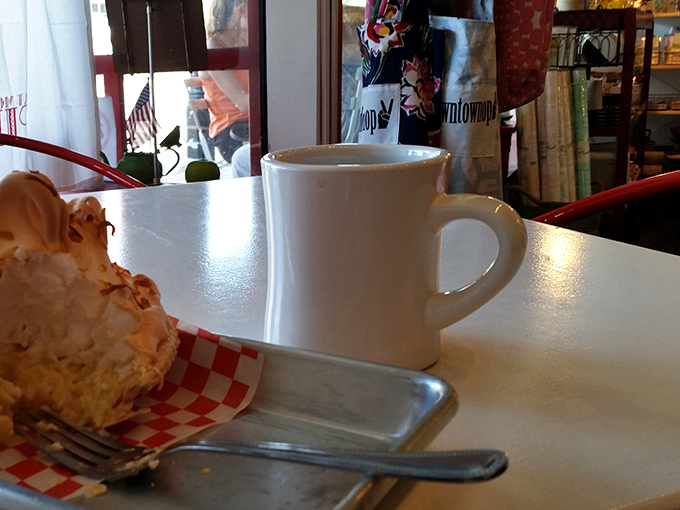 Coffee in a diner mug alongside pie—a combination so perfect it should have its own national holiday. Simple pleasures are the best pleasures.