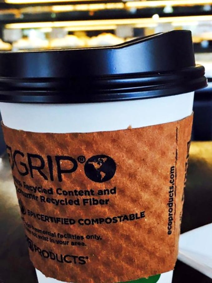 Even the coffee cups here speak to Marilyn's values—eco-friendly vessels for the liquid fuel that helps you justify "just one more" pastry.