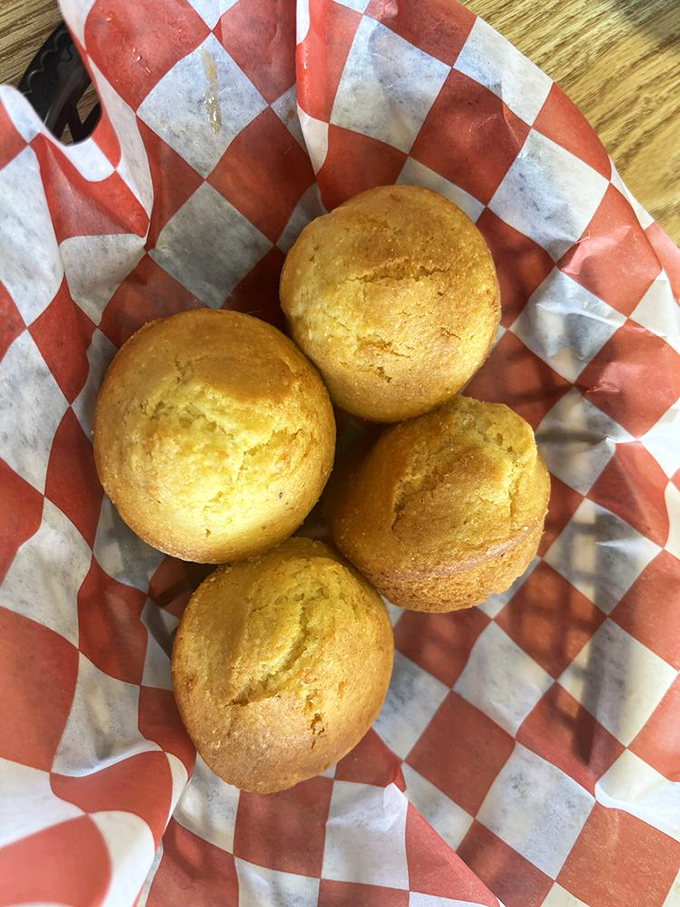 Golden cornbread muffins that strike that perfect balance between sweet and savory—the unsung heroes of any barbecue feast, ready to soak up every last drop of sauce.