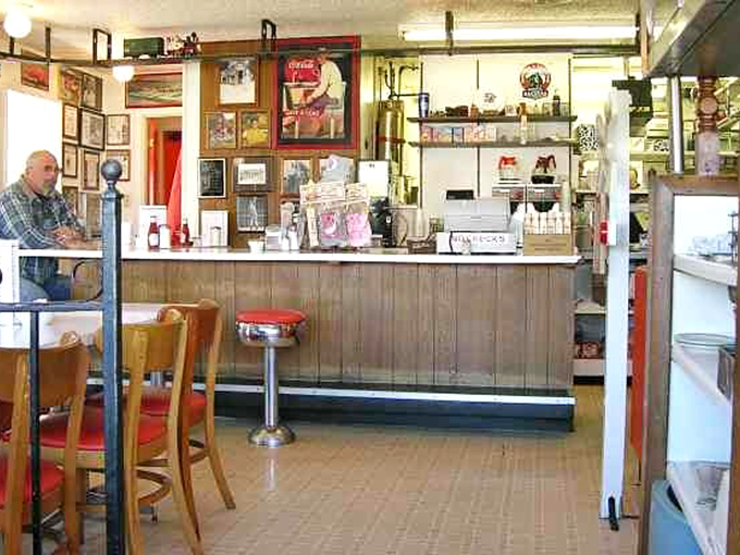 The counter feels like mission control for burger bliss—where friendly faces have been greeting hungry patrons longer than most restaurants have existed.
