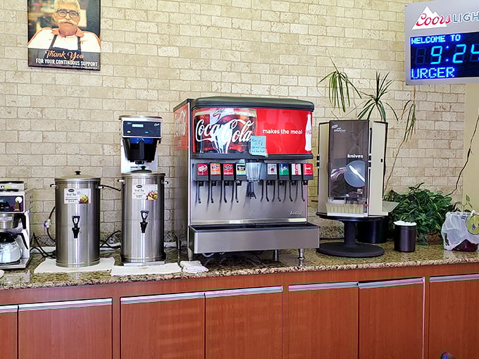 The soda fountain—where decisions about which carbonated companion will join your burger adventure begin.