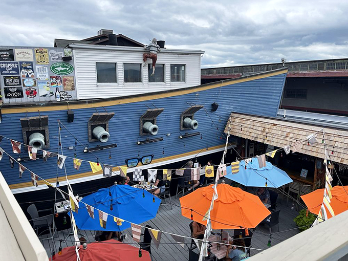 Cooper's fish and chips arrive like Neptune's gift to Pennsylvania—newspaper-lined, golden-crisp, and begging to be doused with malt vinegar or dunked in sauce.