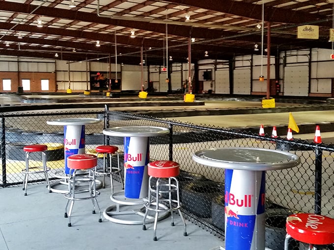 Red Bull pit area: where racers analyze their performance, debate optimal racing lines, and pretend their lower back isn't questioning their life choices.
