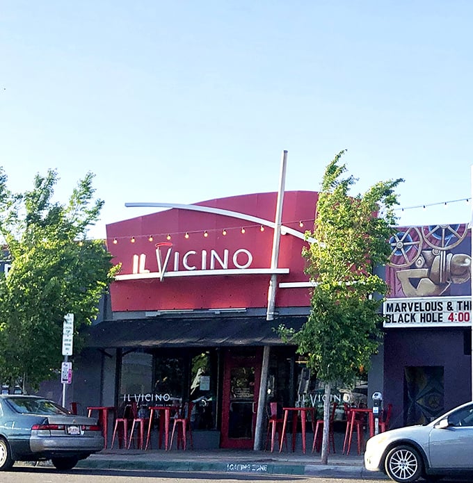 Il Vicino's bold red exterior stands like a Ferrari among sedans on Central Avenue – impossible to miss and promising excitement within.