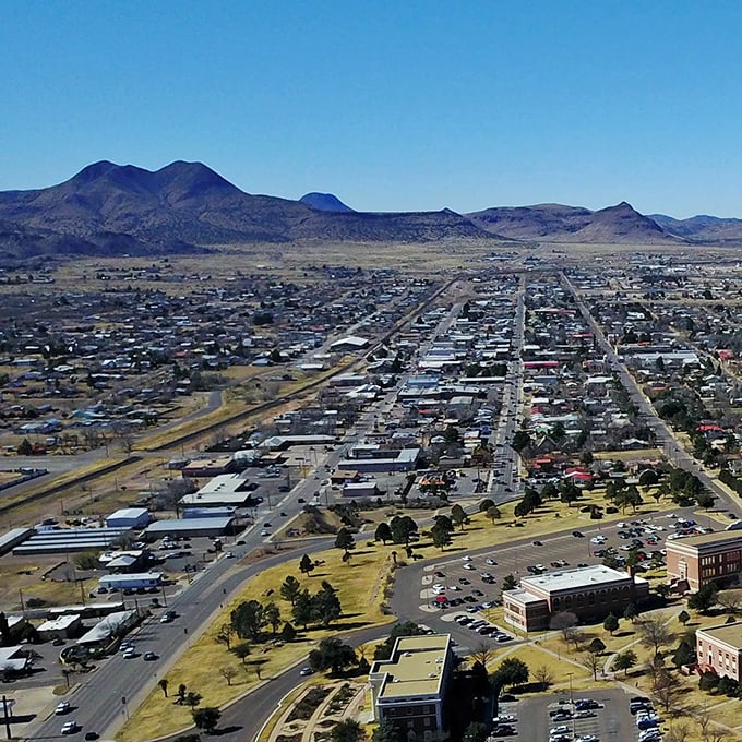 From this vantage point, Alpine spreads out beneath the mountains like a colorful quilt on the West Texas landscape.