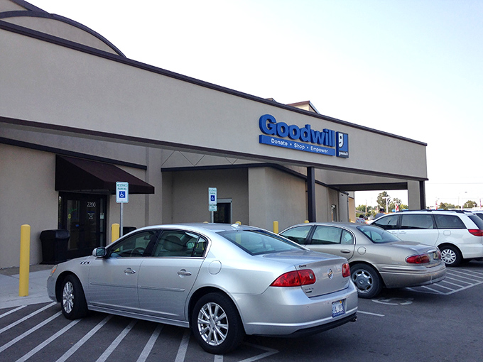 Cars lined up at Goodwill Lawrence – modern-day treasure ships unloading cargo for eager explorers.