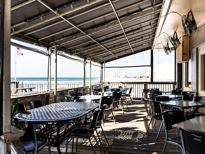 Dining at Sea N Suds' oceanfront tables feels like you've been invited to the most exclusive seafood party—where the dress code is strictly casual.