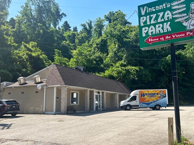 The "Pizza Park" sign promises an amusement park for your taste buds – no height requirement, just an appetite.