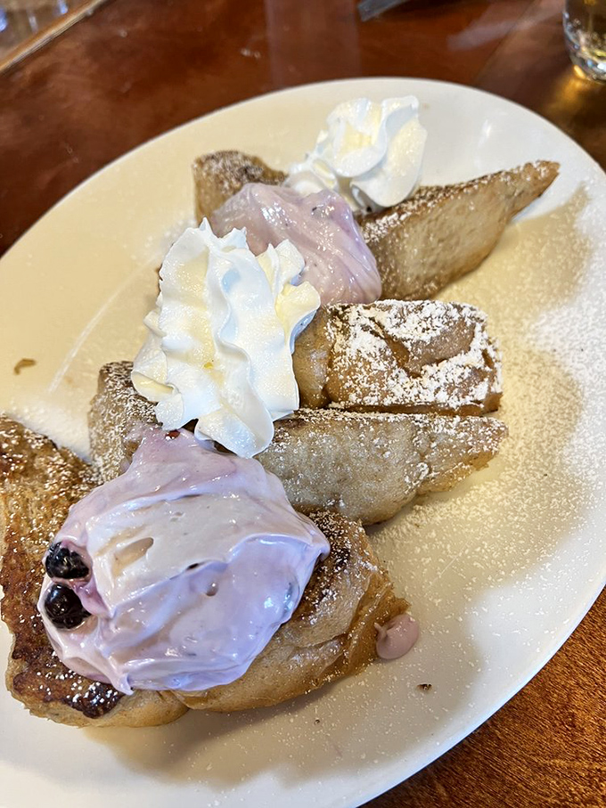 French toast that doesn't just say "good morning" but serenades you with a full breakfast ballad of berries and cream.