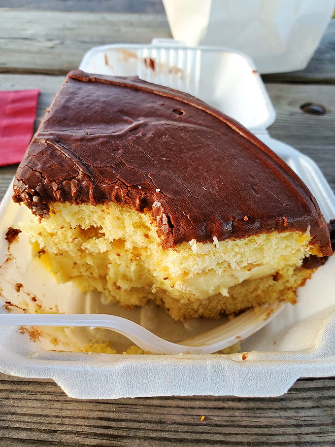 This Boston Cream Pie isn't playing around—with chocolate ganache this glossy, Paul Hollywood would finally offer a handshake without hesitation.