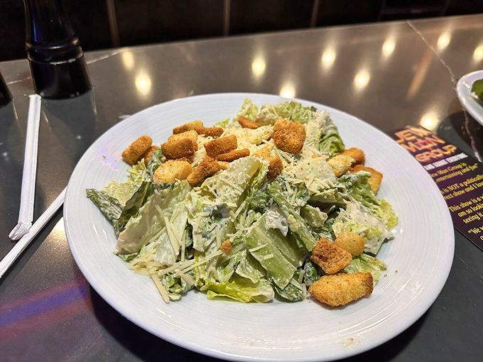 A Caesar salad that Julius himself would cross the Rubicon for—crisp romaine, perfect dressing, and croutons that crunch like winning chips.