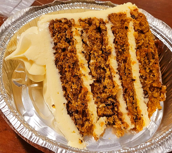 Carrot cake that actually tastes like someone cared about it. Those layers of spiced cake and cream cheese frosting are what dreams are made of.