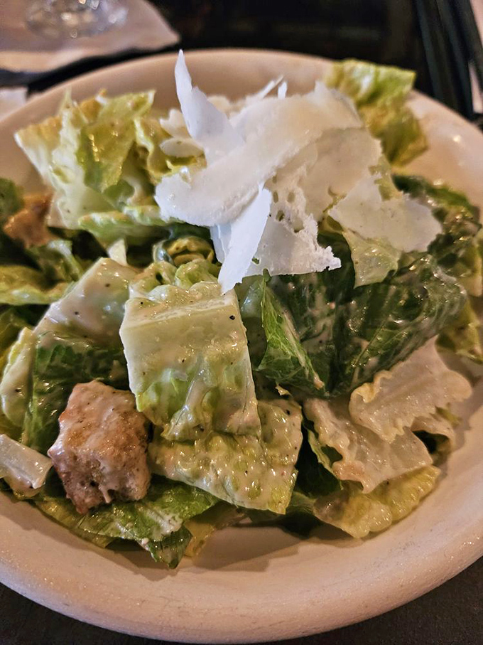A Caesar salad that Julius himself would approve – crisp, perfectly dressed, and assertive enough to stand up to its meaty menu-mates.