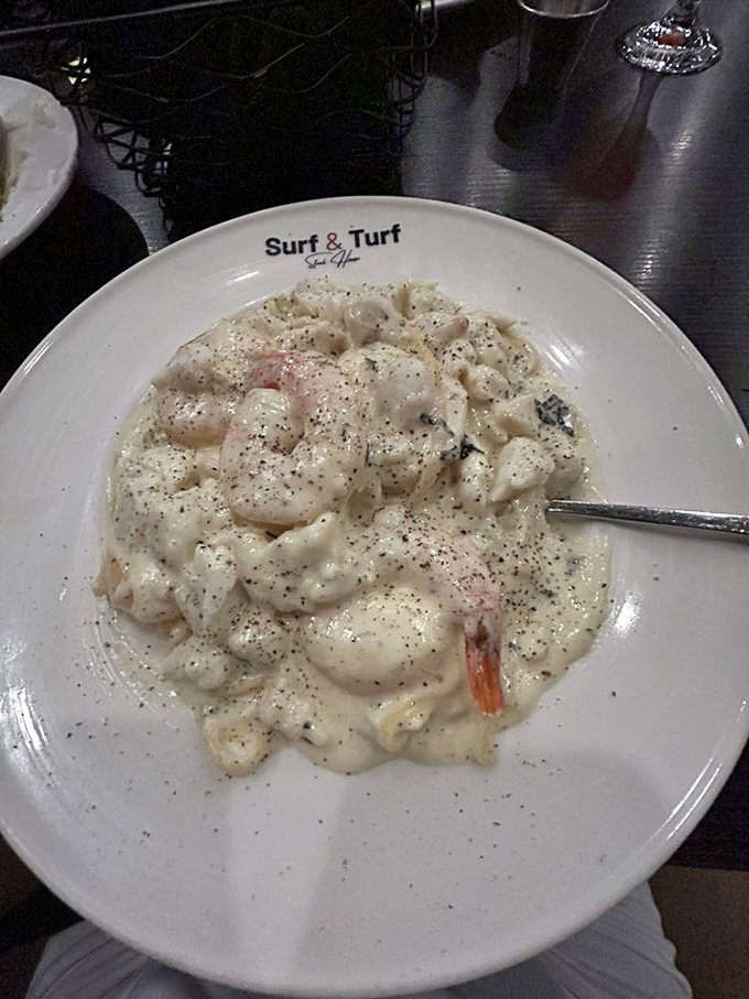 This creamy seafood pasta doesn't just blur the line between surf and turf—it erases it completely in a delicious act of culinary diplomacy.