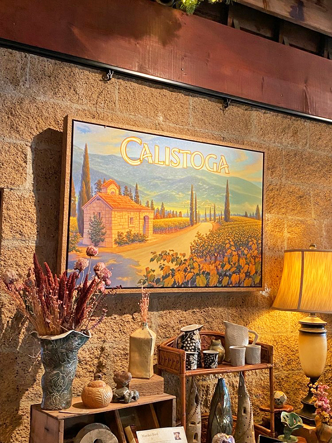 The Calistoga poster isn't just decoration—it's a promise of California's enduring charm. Dried flowers and warm lighting seal the deal.