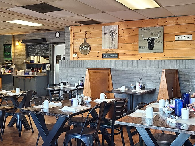Rustic wooden dividers and farmhouse-inspired wall art create dining "neighborhoods" where regulars claim their territory and newcomers feel welcome.