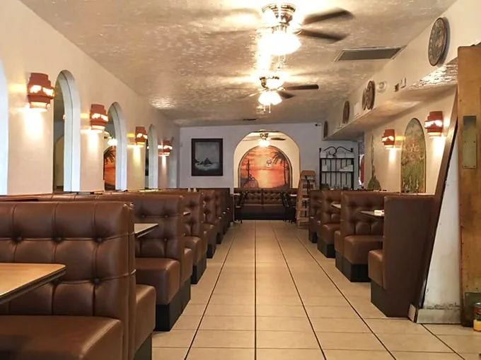 Brown leather booths worn to perfection by decades of happy diners. This isn't décor—it's a culinary time capsule.