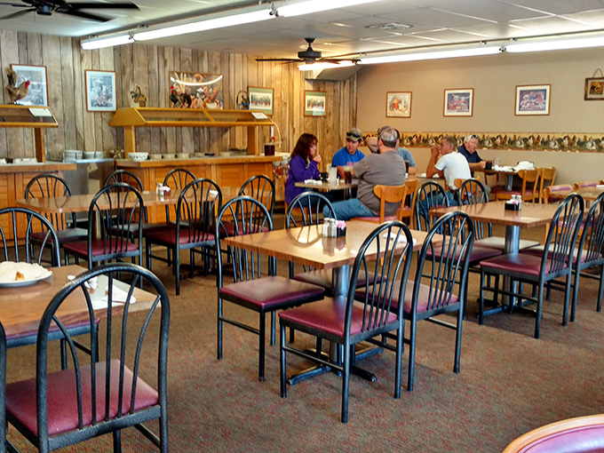 The dining room's wood-paneled walls have absorbed decades of laughter, gossip, and the collective sighs of breakfast satisfaction.
