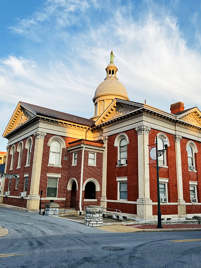 The Augusta County Courthouse dome gleams in golden hour light, a beacon of civic pride and impeccable preservation. Time-travel never looked so good.