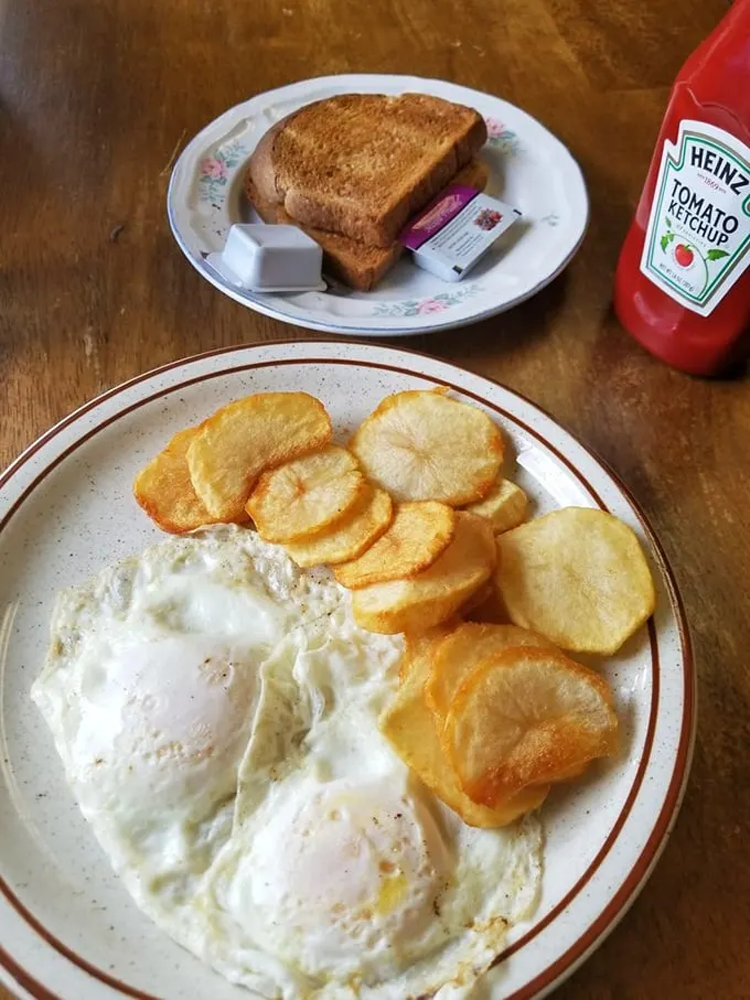 Two eggs and golden home fries with perfectly browned toast—sometimes the classics are classics for a reason. Simplicity that speaks volumes.