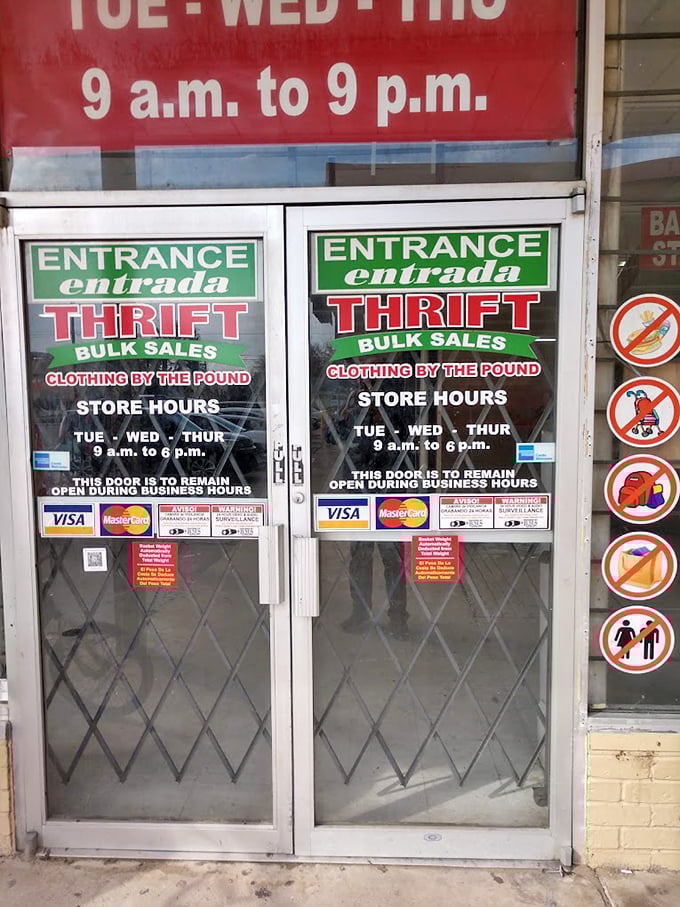The entrance doors – humble portals to a parallel universe where $25 can rebuild your entire wardrobe.