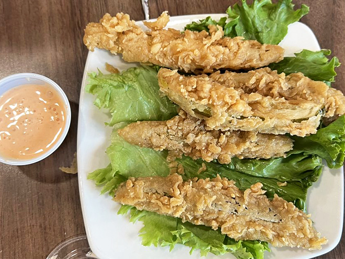 Fried pickles: Where tangy meets crunchy in a Southern food love story. That dipping sauce is just playing matchmaker.