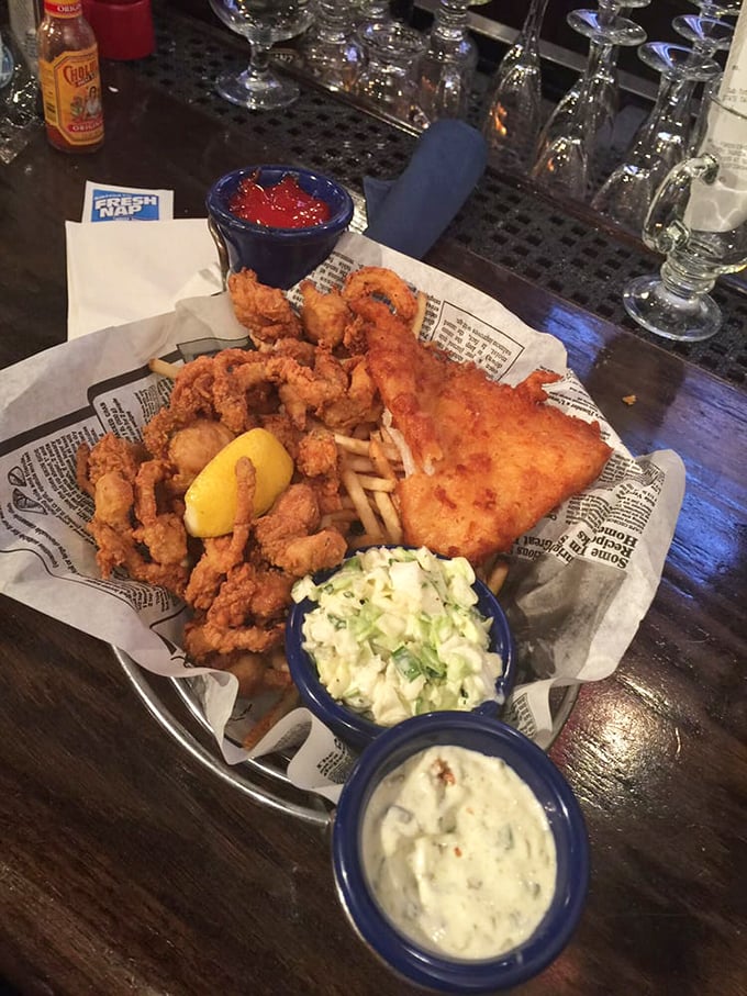 The seafood platter that makes sharing feel like a moral dilemma. Crispy fried goodness served with dipping sauces worth fighting over.