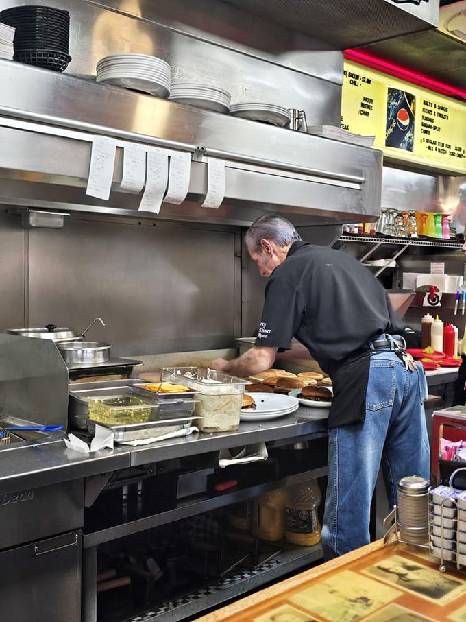 Where the magic happens! Watch as decades of grill wisdom transform simple ingredients into Oklahoma's legendary onion burgers.