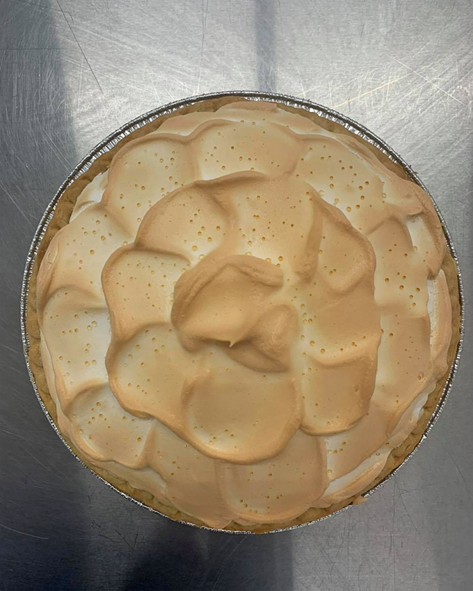 This lemon meringue pie doesn't need Instagram filters – its billowy peaks and sunny yellow filling are already ready for their close-up.