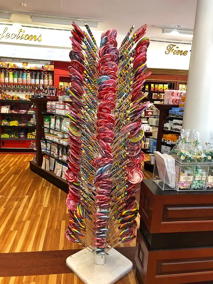This lollipop tree isn't just store decoration—it's practically a modern art installation celebrating the spiral geometry of pure sugar joy.