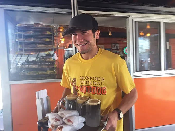 The yellow shirt says it all – these folks are proud ambassadors of Monroe's traditions, serving up happiness with every order.