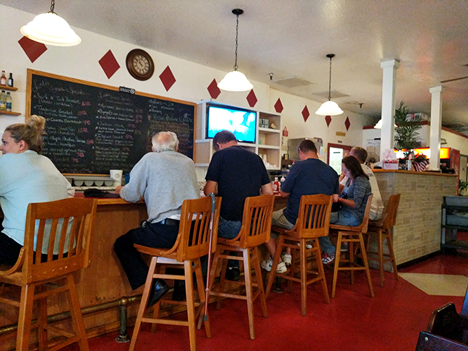 Counter seating where breakfast dreams come true, with a front-row view of short-order choreography that rivals Broadway for entertainment value.